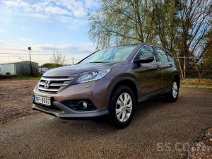Pelēks Honda CR-V 2015 Rīga, ar dzinēja tilpumu 1.60 L un nobraukumu 241 tūkst. km par 9500 €, foto 32 vietnē AUTOMOTO.COM.LV