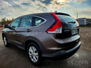 Pelēks Honda CR-V 2015 Rīga, ar dzinēja tilpumu 1.60 L un nobraukumu 241 tūkst. km par 9500 €, foto 34 vietnē AUTOMOTO.COM.LV