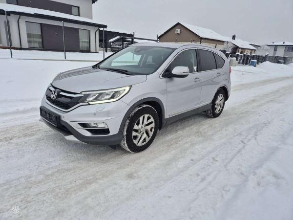 Grey Honda CR-V 2015 in Kaunas, with an engine capacity of 1.60 L and mileage of 284 thousand km for 7200 €, photo 1 on AUTOMOTO.COM.LV