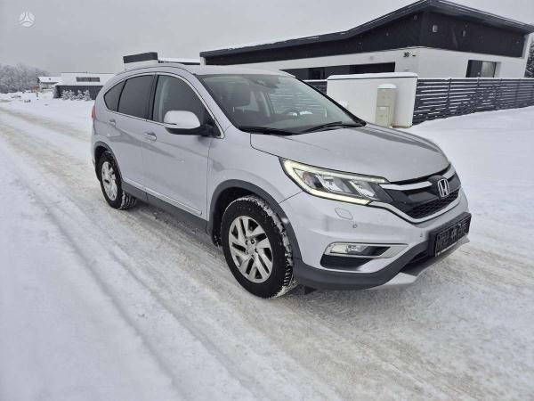 Grey Honda CR-V 2015 in Kaunas, with an engine capacity of 1.60 L and mileage of 284 thousand km for 7200 €, photo 3 on AUTOMOTO.COM.LV