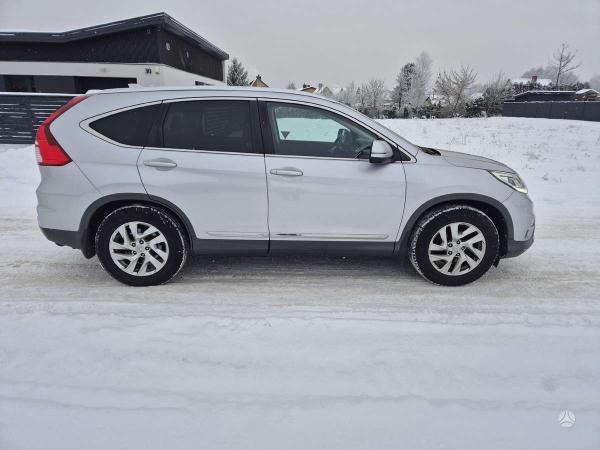Grey Honda CR-V 2015 in Kaunas, with an engine capacity of 1.60 L and mileage of 284 thousand km for 7200 €, photo 4 on AUTOMOTO.COM.LV