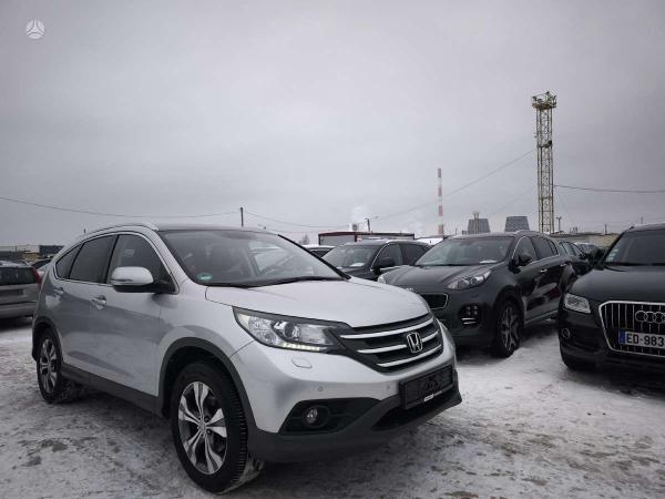 Grey Honda CR-V 2015 in Vilnius, with an engine capacity of 2.20 L and mileage of 215 thousand km for 11950 €, photo 3 on AUTOMOTO.COM.LV