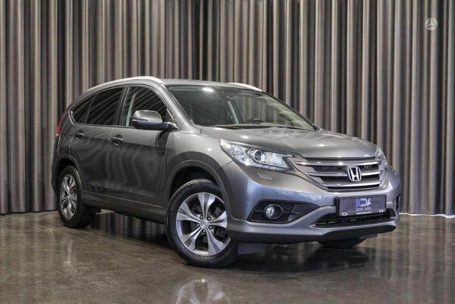 Grey Honda CR-V 2015 in Marijampole, with an engine capacity of 2.20 L and mileage of 176 thousand km for 11950 €, photo 1 on AUTOMOTO.COM.LV
