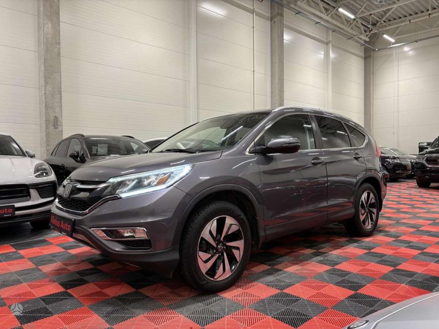 Grey Honda CR-V 2015 in Vilnius, with an engine capacity of 2.36 L and mileage of 163 thousand km for 14500 €, photo 1 on AUTOMOTO.COM.LV