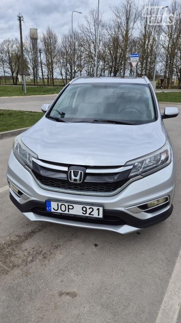 Pelēks Honda CR-V 2015 Kauņa, ar dzinēja tilpumu 2.40 L un nobraukumu 192 tūkst. km par 8800 €, foto 2 vietnē AUTOMOTO.COM.LV