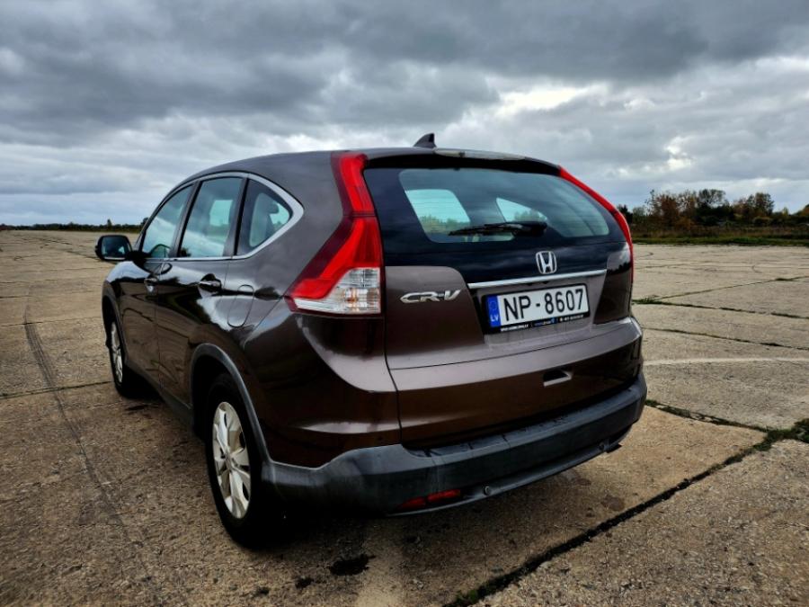 Pelēks Honda CR-V 2015 Rīga, ar dzinēja tilpumu 1.60 L un nobraukumu 238 tūkst. km par 10800 €, foto 21 vietnē AUTOMOTO.COM.LV