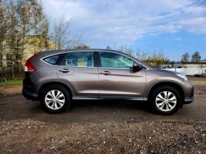 Pelēks Honda CR-V 2015 Rīga, ar dzinēja tilpumu 1.60 L un nobraukumu 238 tūkst. km par 10800 €, foto 26 vietnē AUTOMOTO.COM.LV