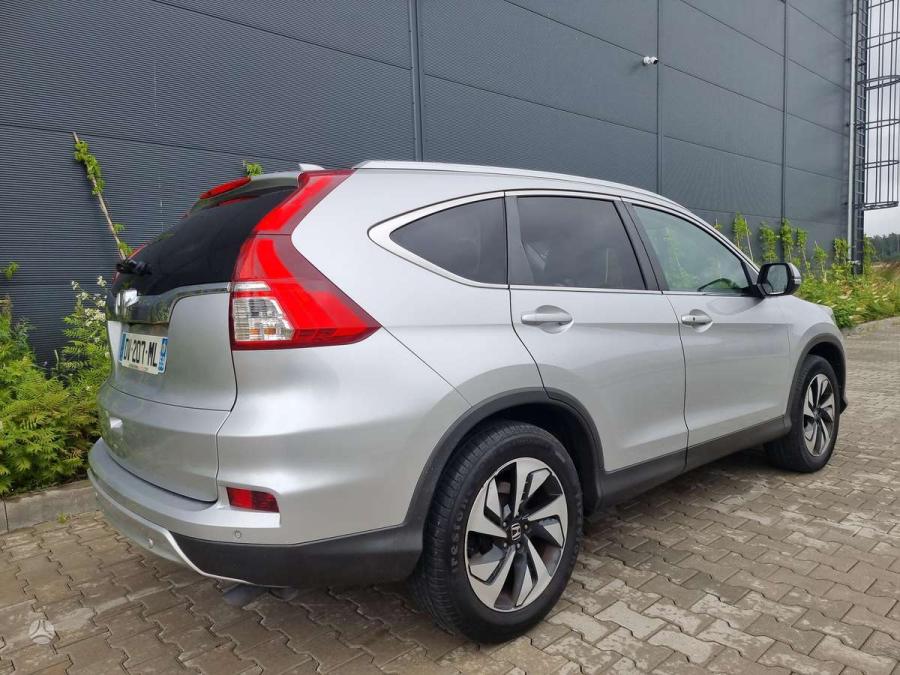 Grey Honda CR-V 2015 in Vilnius, with an engine capacity of 1.60 L and mileage of 205 thousand km for 12950 €, photo 3 on AUTOMOTO.COM.LV