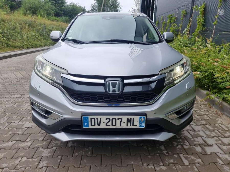 Grey Honda CR-V 2015 in Vilnius, with an engine capacity of 1.60 L and mileage of 205 thousand km for 12950 €, photo 4 on AUTOMOTO.COM.LV