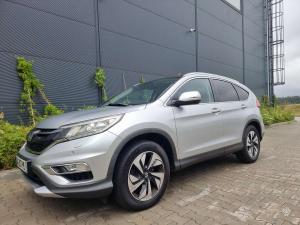 Grey Honda CR-V 2015 in Vilnius, with an engine capacity of 1.60 L and mileage of 205 thousand km for 12950 €, photo 6 on AUTOMOTO.COM.LV