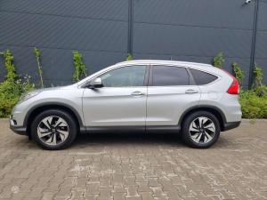 Grey Honda CR-V 2015 in Vilnius, with an engine capacity of 1.60 L and mileage of 205 thousand km for 12950 €, photo 8 on AUTOMOTO.COM.LV