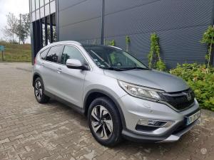 Grey Honda CR-V 2015 in Vilnius, with an engine capacity of 1.60 L and mileage of 205 thousand km for 12950 €, photo 9 on AUTOMOTO.COM.LV