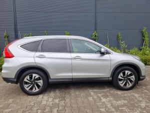 Grey Honda CR-V 2015 in Vilnius, with an engine capacity of 1.60 L and mileage of 205 thousand km for 12950 €, photo 10 on AUTOMOTO.COM.LV