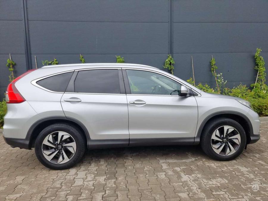 Grey Honda CR-V 2015 in Vilnius, with an engine capacity of 1.60 L and mileage of 205 thousand km for 12950 €, photo 10 on AUTOMOTO.COM.LV