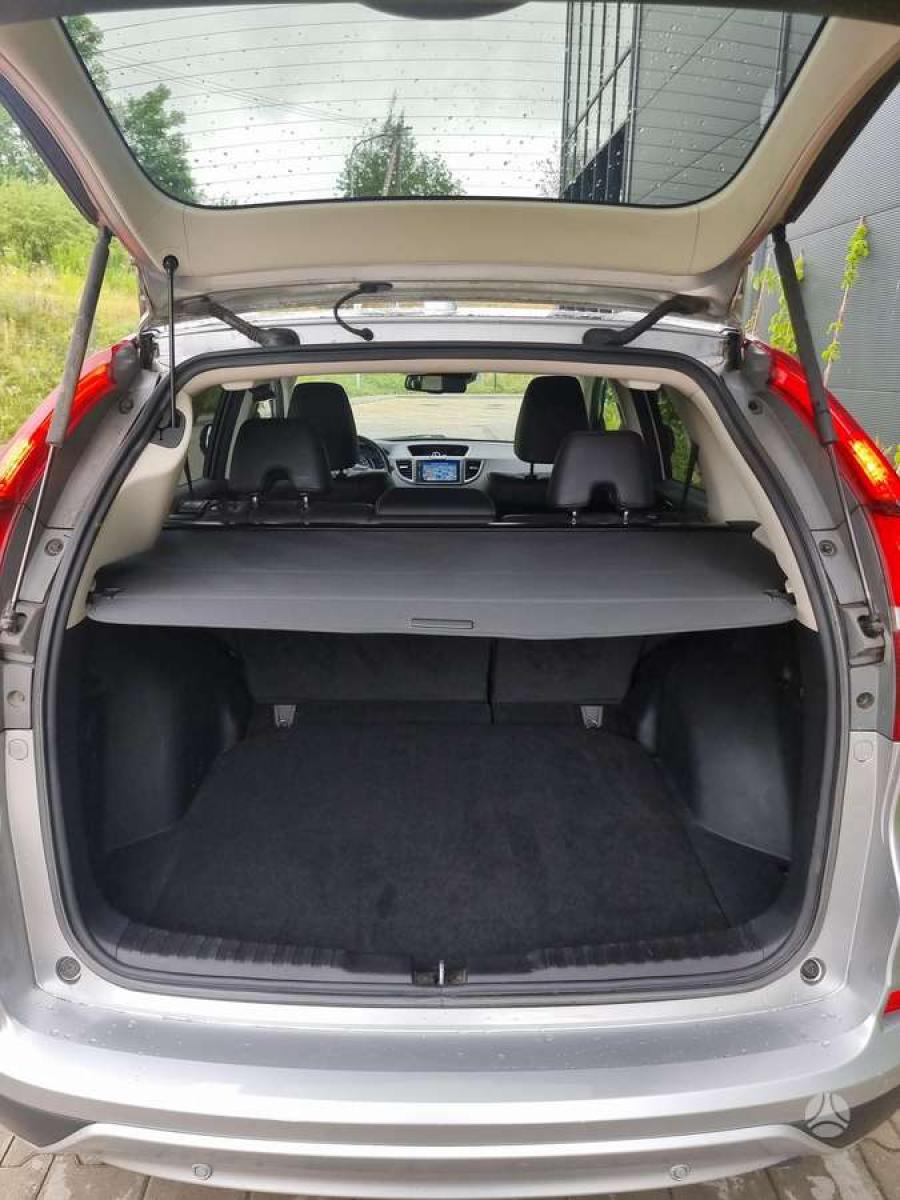 Grey Honda CR-V 2015 in Vilnius, with an engine capacity of 1.60 L and mileage of 205 thousand km for 12950 €, photo 11 on AUTOMOTO.COM.LV