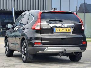 Grey Honda CR-V 2015 in Siauliai, with an engine capacity of 1.60 L and mileage of 300 thousand km for 12990 €, photo 4 on AUTOMOTO.COM.LV