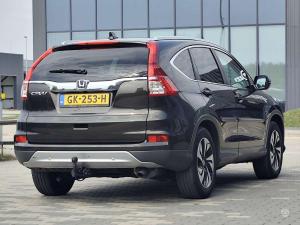 Grey Honda CR-V 2015 in Siauliai, with an engine capacity of 1.60 L and mileage of 300 thousand km for 12990 €, photo 5 on AUTOMOTO.COM.LV