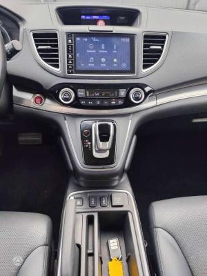 Grey Honda CR-V 2015 in Siauliai, with an engine capacity of 1.60 L and mileage of 300 thousand km for 12990 €, photo 10 on AUTOMOTO.COM.LV