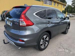 Grey Honda CR-V 2015 in Taurage, with an engine capacity of 1.60 L and mileage of 212 thousand km for 12200 €, photo 5 on AUTOMOTO.COM.LV