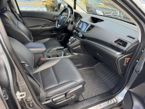 Grey Honda CR-V 2015 in Taurage, with an engine capacity of 1.60 L and mileage of 212 thousand km for 12200 €, photo 17 on AUTOMOTO.COM.LV