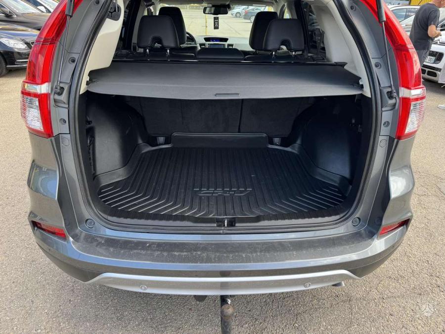 Grey Honda CR-V 2015 in Taurage, with an engine capacity of 1.60 L and mileage of 212 thousand km for 12200 €, photo 22 on AUTOMOTO.COM.LV