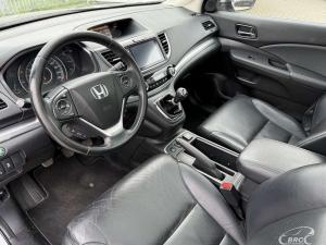 Grey Honda CR-V 2015 in Klaipeda, with an engine capacity of 1.60 L and mileage of 243 thousand km for 9500 €, photo 18 on AUTOMOTO.COM.LV