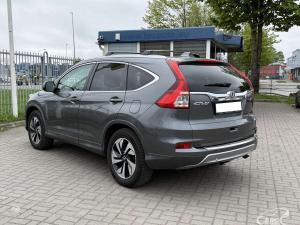 Grey Honda CR-V 2015 in Klaipeda, with an engine capacity of 1.60 L and mileage of 243 thousand km for 9500 €, photo 31 on AUTOMOTO.COM.LV
