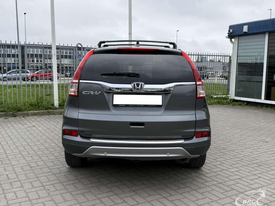 Grey Honda CR-V 2015 in Klaipeda, with an engine capacity of 1.60 L and mileage of 243 thousand km for 9500 €, photo 32 on AUTOMOTO.COM.LV