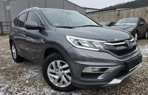 Grey Honda CR-V 2016 in Kaunas, with an engine capacity of 1.60 L and mileage of 280 thousand km for 10990 €, photo  on AUTOMOTO.COM.LV