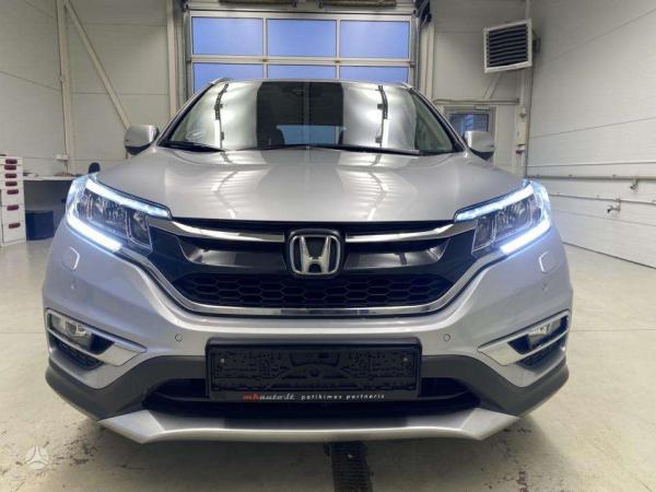 Grey Honda CR-V 2016 in Radviliskis, with an engine capacity of 1.60 L and mileage of 293 thousand km for 9750 €, photo 5 on AUTOMOTO.COM.LV