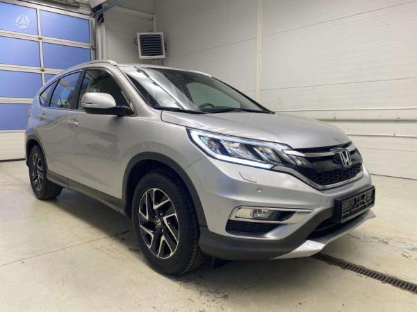 Grey Honda CR-V 2016 in Radviliskis, with an engine capacity of 1.60 L and mileage of 293 thousand km for 9550 €, photo 2 on AUTOMOTO.COM.LV