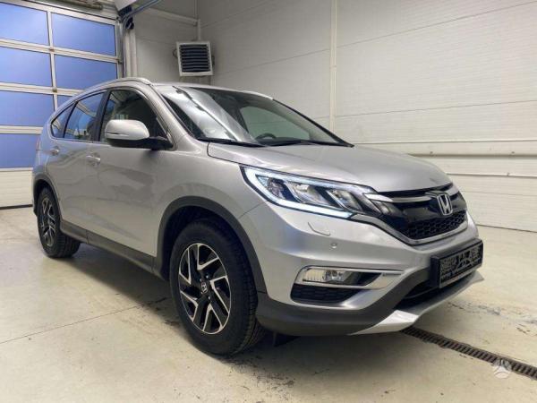 Grey Honda CR-V 2016 in Radviliskis, with an engine capacity of 1.60 L and mileage of 293 thousand km for 9550 €, photo 2 on AUTOMOTO.COM.LV