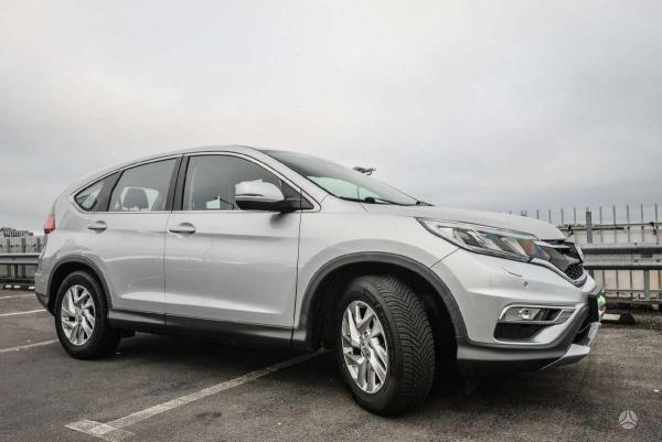 Grey Honda CR-V 2016 in Vilnius, with an engine capacity of 1.60 L and mileage of 121 thousand km for 13800 €, photo 4 on AUTOMOTO.COM.LV