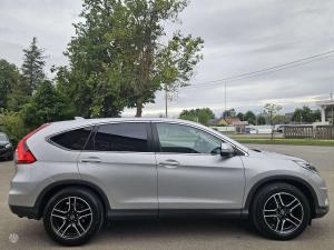 Grey Honda CR-V 2016 in Siauliai, with an engine capacity of 2.00 L and mileage of 274 thousand km for 13950 €, photo 7 on AUTOMOTO.COM.LV