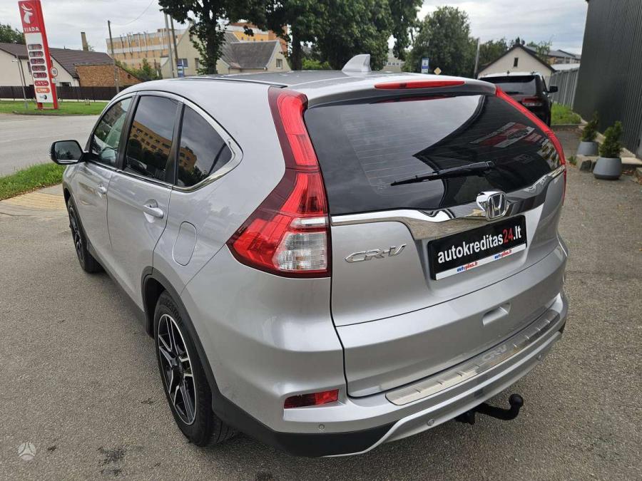 Grey Honda CR-V 2016 in Siauliai, with an engine capacity of 2.00 L and mileage of 274 thousand km for 13950 €, photo 8 on AUTOMOTO.COM.LV