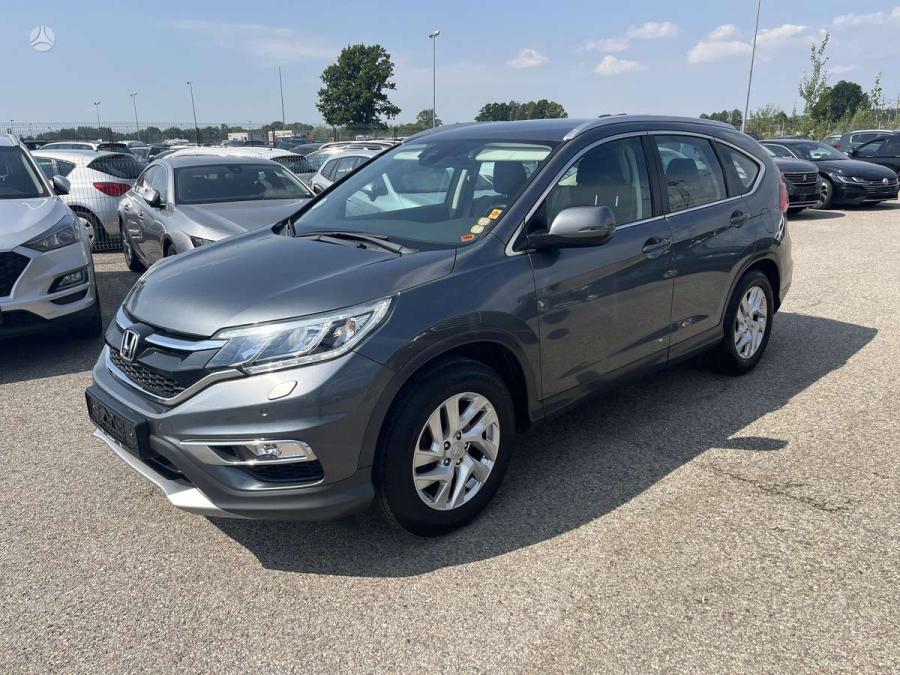 Grey Honda CR-V 2016 in Marijampole, with an engine capacity of 1.60 L and mileage of 221 thousand km for 9900 €, photo 1 on AUTOMOTO.COM.LV