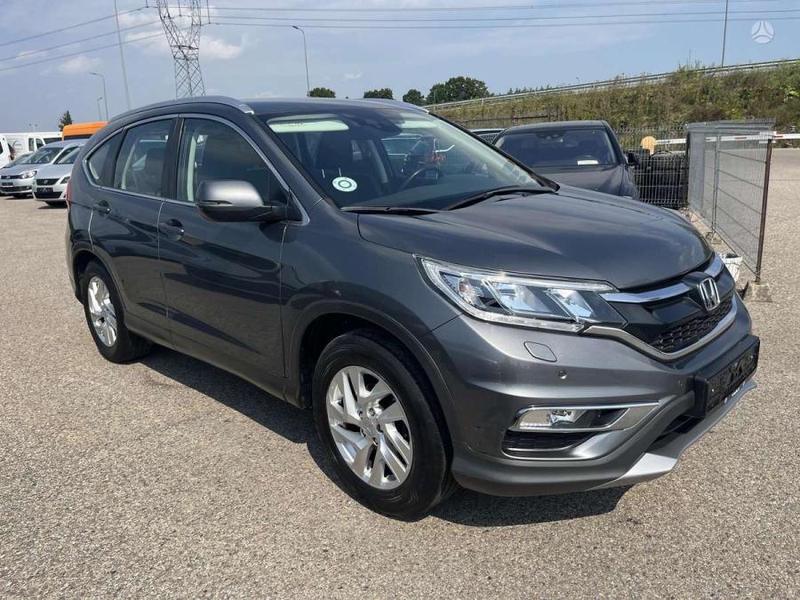 Grey Honda CR-V 2016 in Marijampole, with an engine capacity of 1.60 L and mileage of 221 thousand km for 9900 €, photo 4 on AUTOMOTO.COM.LV