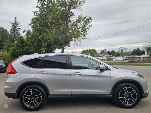 Grey Honda CR-V 2016 in Siauliai, with an engine capacity of 2.00 L and mileage of 274 thousand km for 13950 €, photo 7 on AUTOMOTO.COM.LV