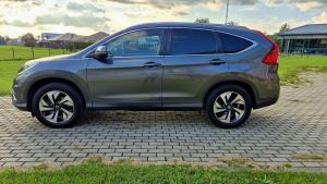 Grey Honda CR-V 2016 in Taurage, with an engine capacity of 1.60 L and mileage of 219 thousand km for 12300 €, photo 5 on AUTOMOTO.COM.LV