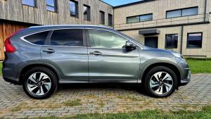 Grey Honda CR-V 2016 in Taurage, with an engine capacity of 1.60 L and mileage of 219 thousand km for 12300 €, photo 6 on AUTOMOTO.COM.LV