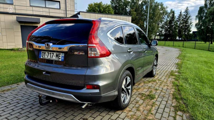 Grey Honda CR-V 2016 in Taurage, with an engine capacity of 1.60 L and mileage of 219 thousand km for 12300 €, photo 7 on AUTOMOTO.COM.LV