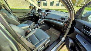 Grey Honda CR-V 2016 in Taurage, with an engine capacity of 1.60 L and mileage of 219 thousand km for 12300 €, photo 14 on AUTOMOTO.COM.LV
