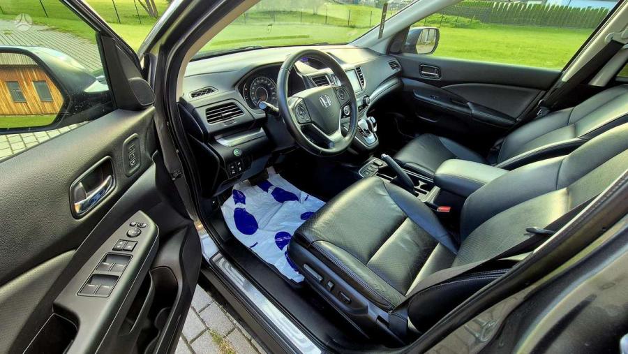 Grey Honda CR-V 2016 in Taurage, with an engine capacity of 1.60 L and mileage of 219 thousand km for 12300 €, photo 15 on AUTOMOTO.COM.LV