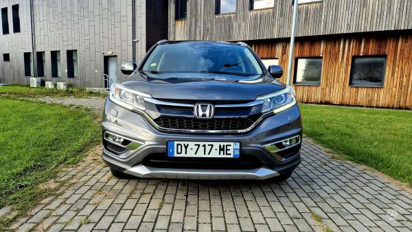 Grey Honda CR-V 2016 in Taurage, with an engine capacity of 1.60 L and mileage of 219 thousand km for 12300 €, photo 4 on AUTOMOTO.COM.LV