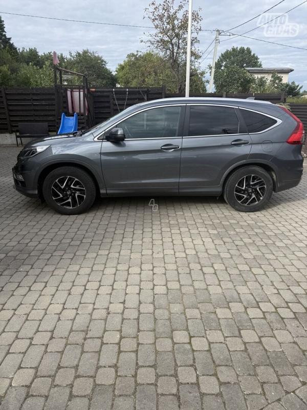 Pelēks Honda CR-V 2016 Viļņa, ar dzinēja tilpumu 1.60 L un nobraukumu 150 tūkst. km par 12800 €, foto 8 vietnē AUTOMOTO.COM.LV