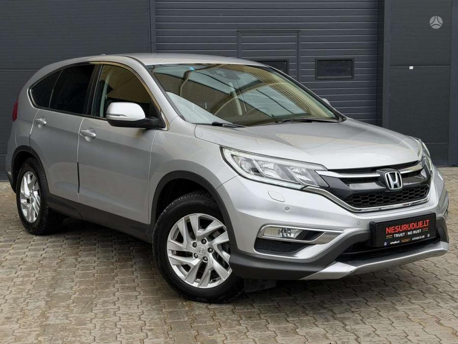 Grey Honda CR-V 2016 in Vilnius, with an engine capacity of 1.60 L and mileage of 190 thousand km for 12999 €, photo 7 on AUTOMOTO.COM.LV