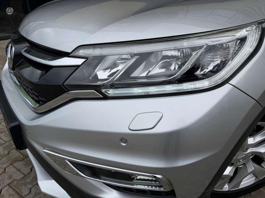 Grey Honda CR-V 2016 in Vilnius, with an engine capacity of 1.60 L and mileage of 190 thousand km for 12999 €, photo 8 on AUTOMOTO.COM.LV
