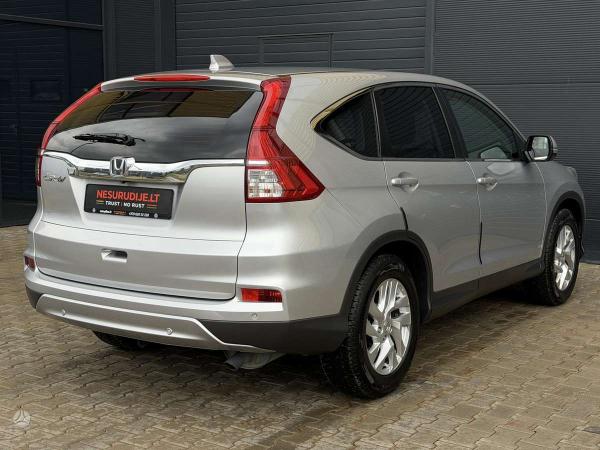 Grey Honda CR-V 2016 in Vilnius, with an engine capacity of 1.60 L and mileage of 190 thousand km for 12999 €, photo 5 on AUTOMOTO.COM.LV