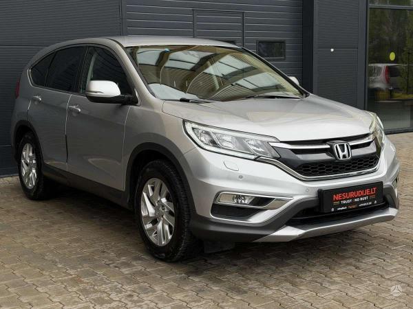 Grey Honda CR-V 2016 in Vilnius, with an engine capacity of 1.60 L and mileage of 190 thousand km for 12999 €, photo 6 on AUTOMOTO.COM.LV