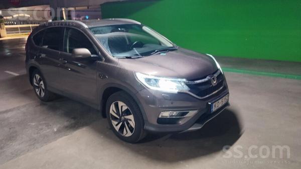 Grey Honda CR-V 2017 in Riga, with an engine capacity of 1.60 L and mileage of 240 thousand km for 14799 €, photo 7 on AUTOMOTO.COM.LV
